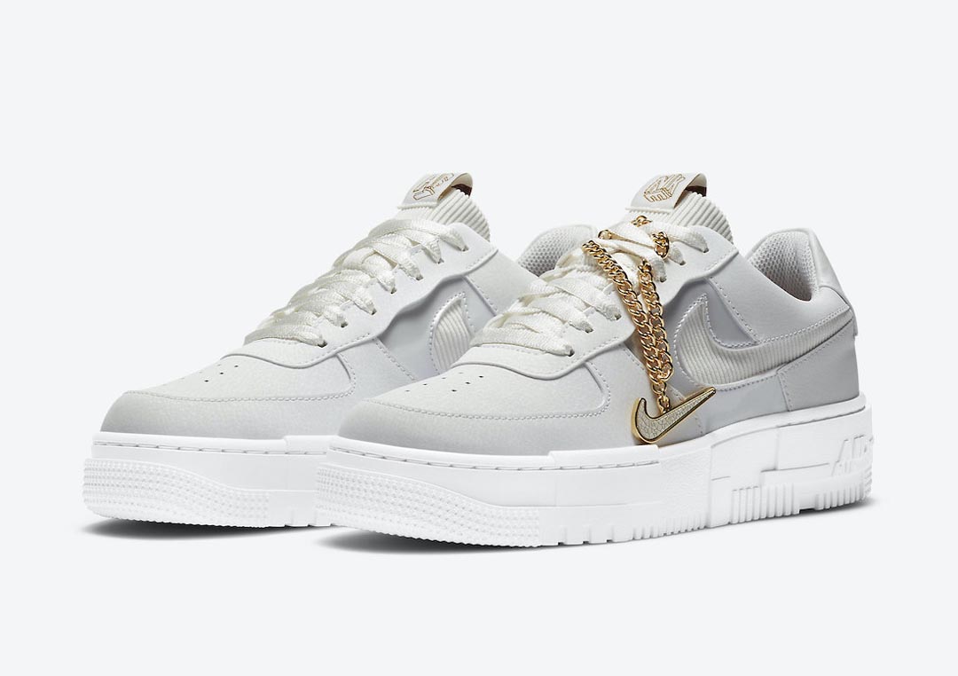 A Gold Swoosh & Chain Pop Against This Greyed-out Air Force 1 Pixel ...